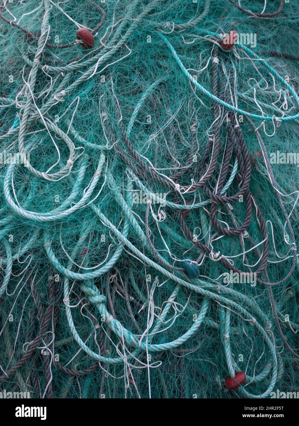 Vertical view of fishing nets in the harbour Stock Photo - Alamy