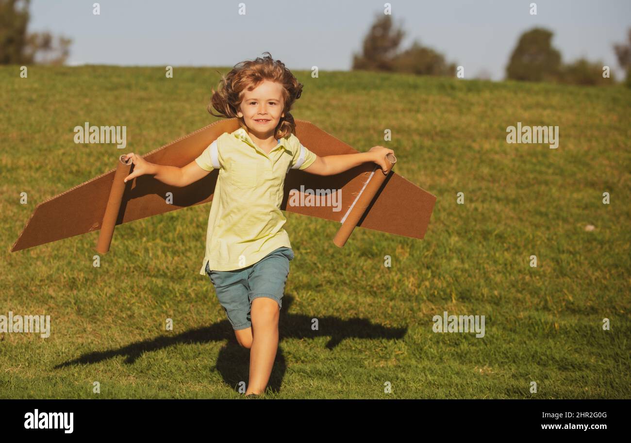 Freedom kids, boy playing to be airplane pilot, funny guy with ...