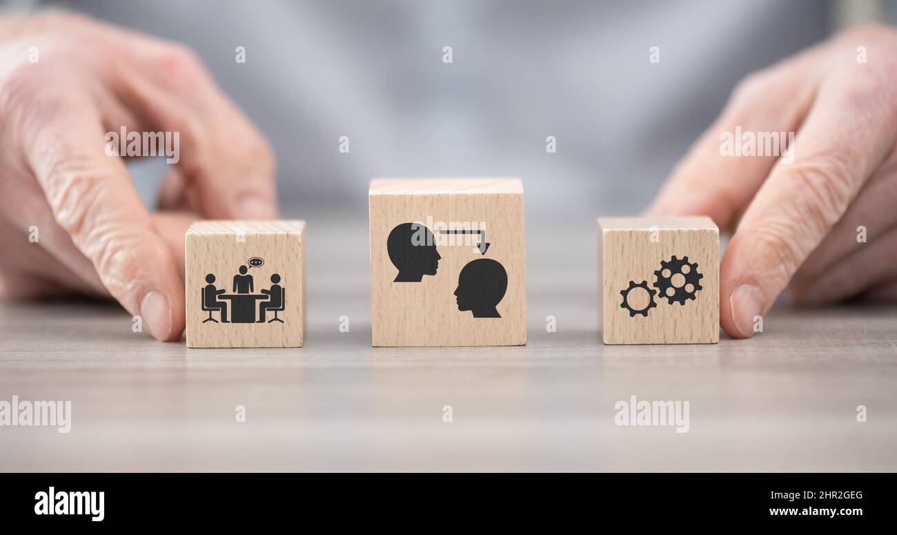 Wooden blocks with symbol of coaching concept Stock Photo - Alamy