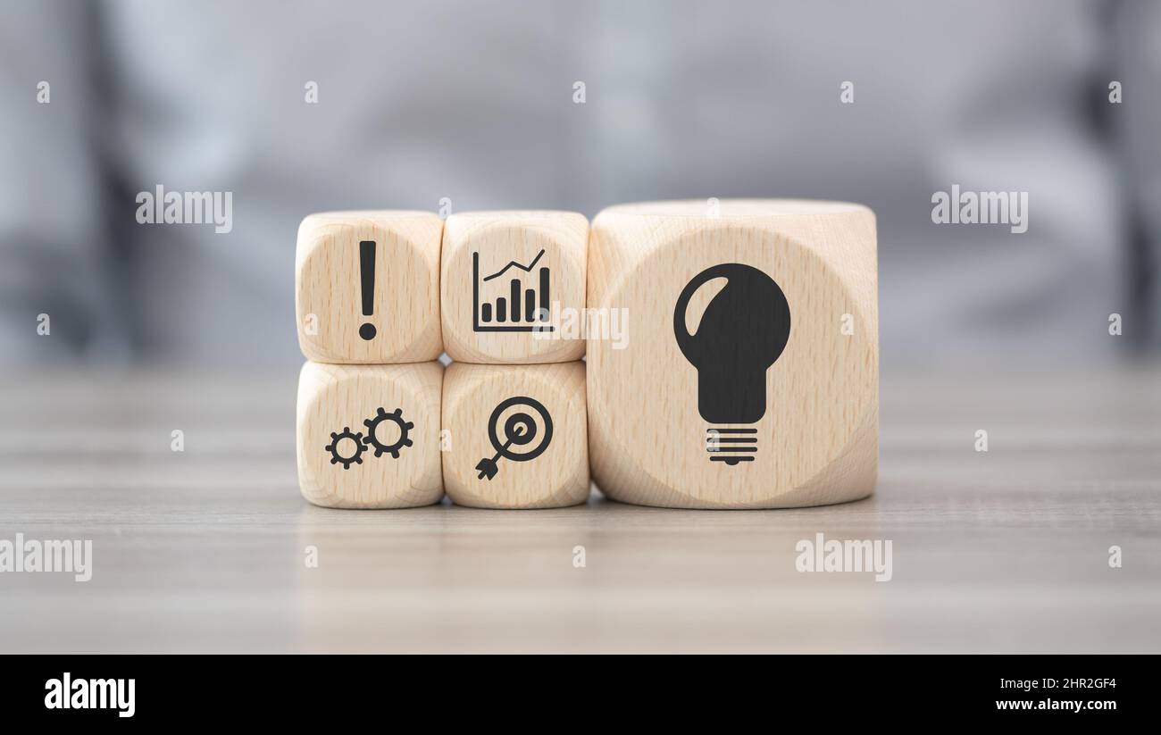 Wooden blocks with symbol of innovation concept Stock Photo - Alamy