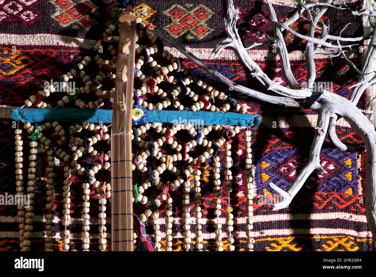 traditional Turkish rug, Turkish musical instrument baglama and amulet ...