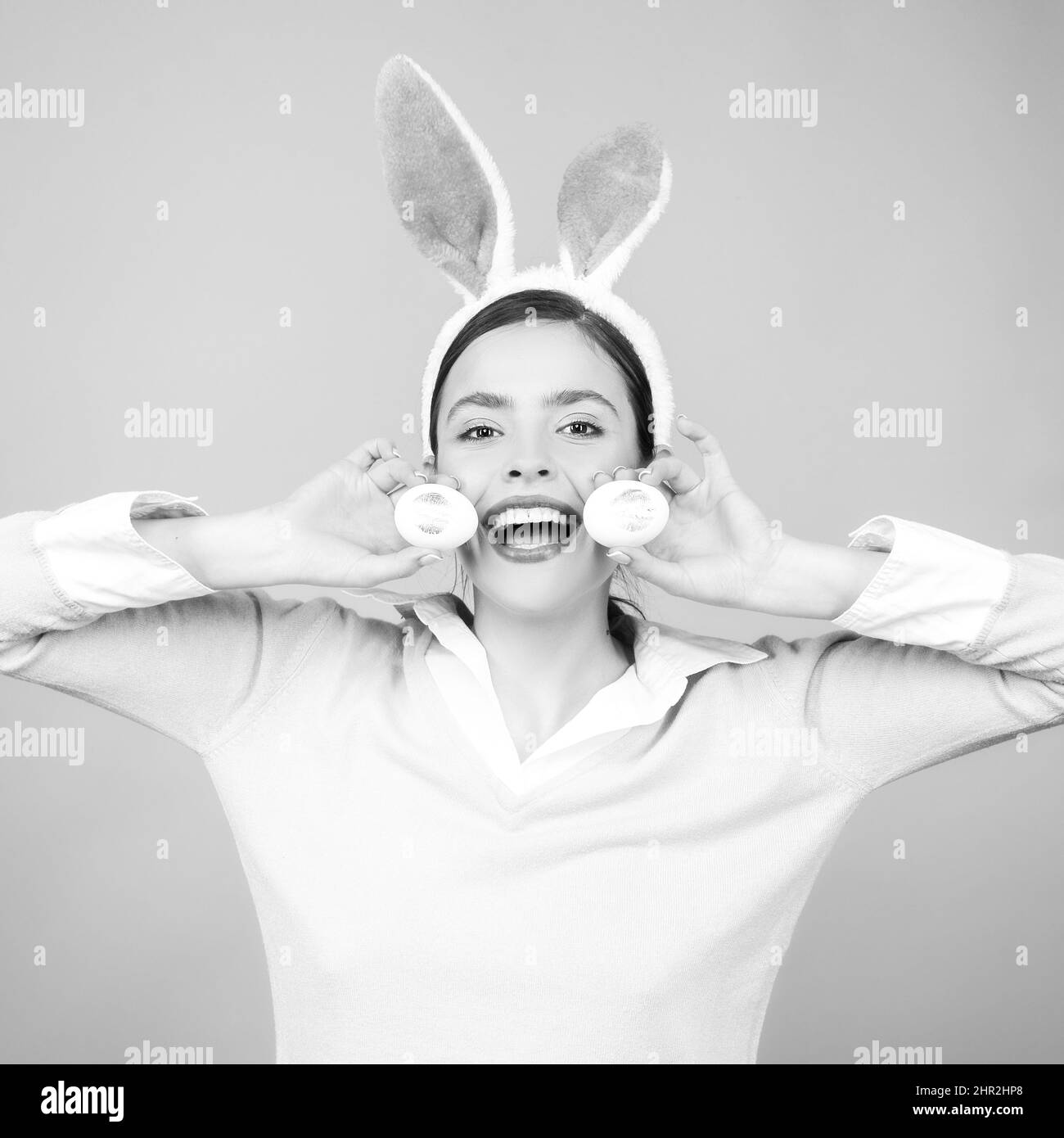 Bunny rabbit girl with easter egg. Woman in rabbit ears. Egg hunt Stock ...