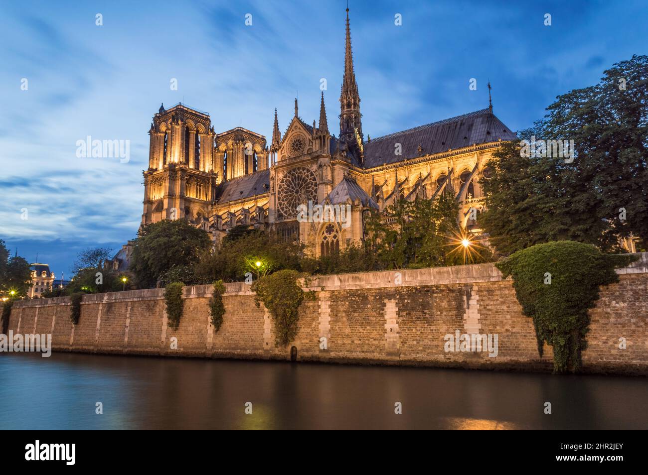 The Cathedral of Notre Dame illuminated during the blue hour, Paris ...