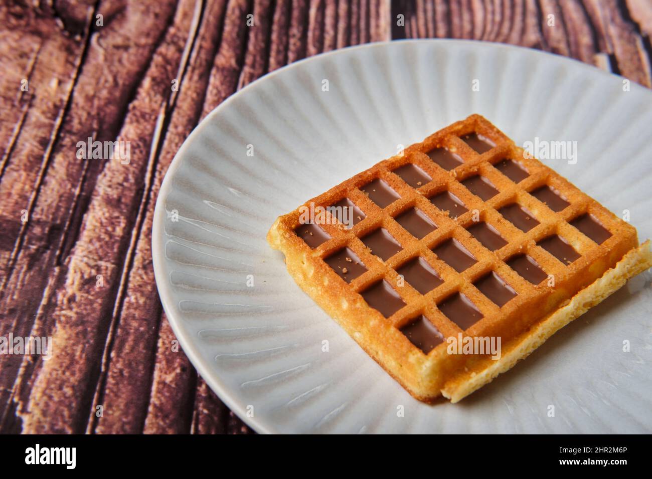 Chocolate & hazelnut flavour waffle from on a white plate Stock Photo ...