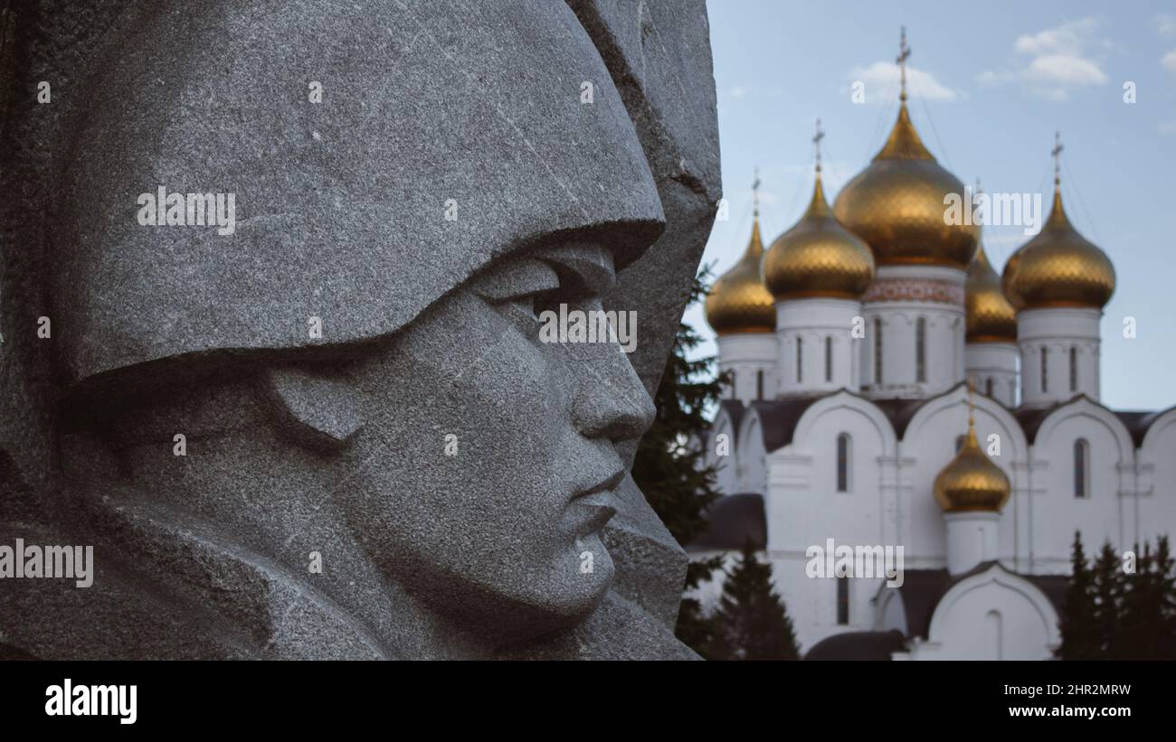 A communist monument stands ahead of Transfiguration Cathedral ...