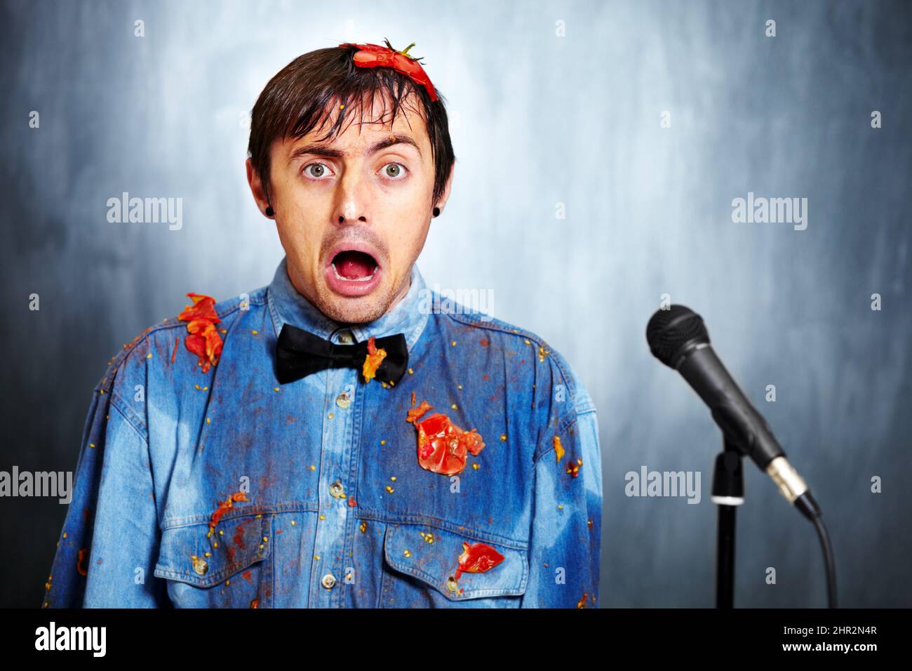 Looks like the jokes on him. Portrait of a bad standup comedian covered ...