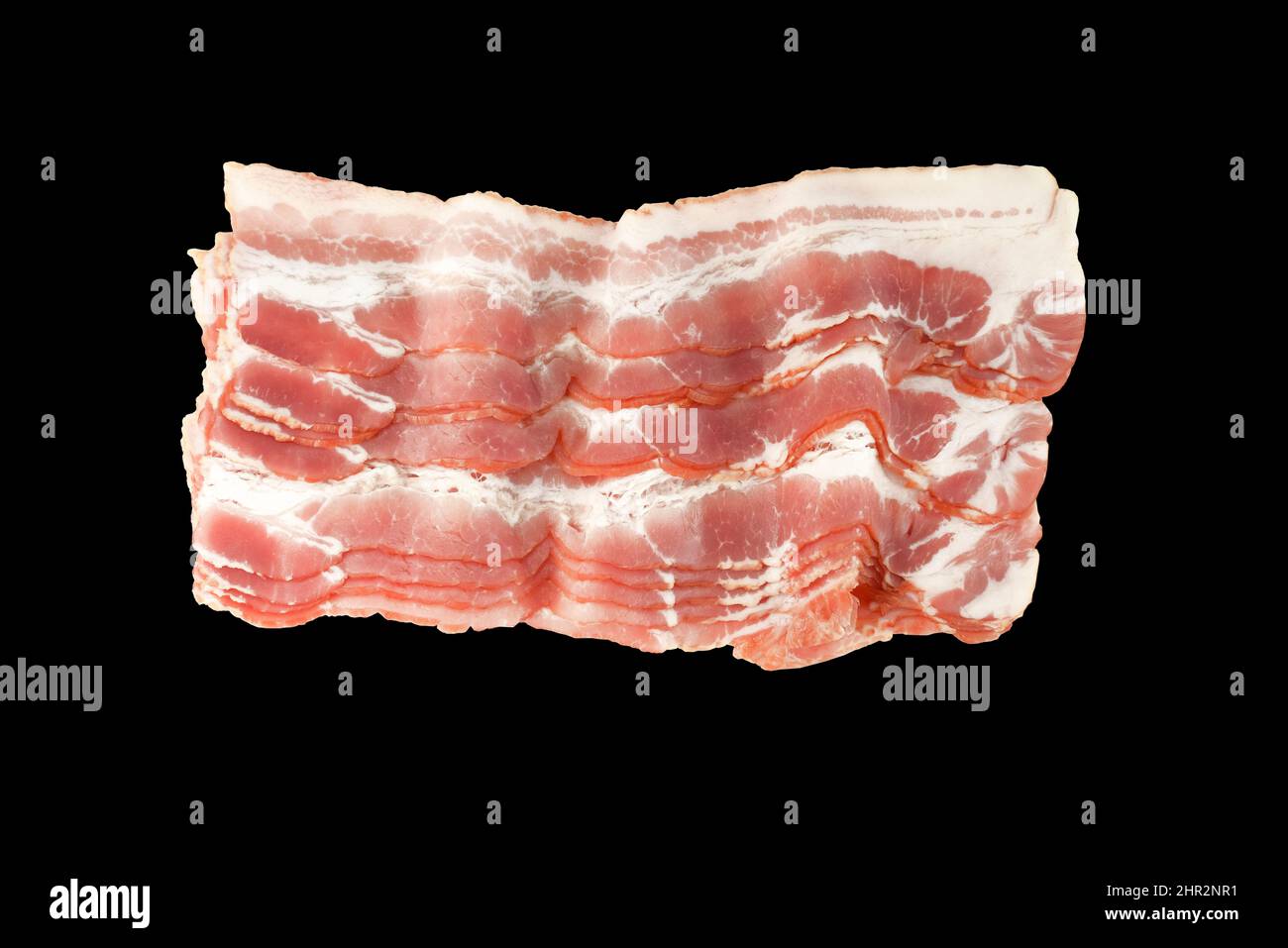 Meat bacon with veins on a black background Stock Photo - Alamy
