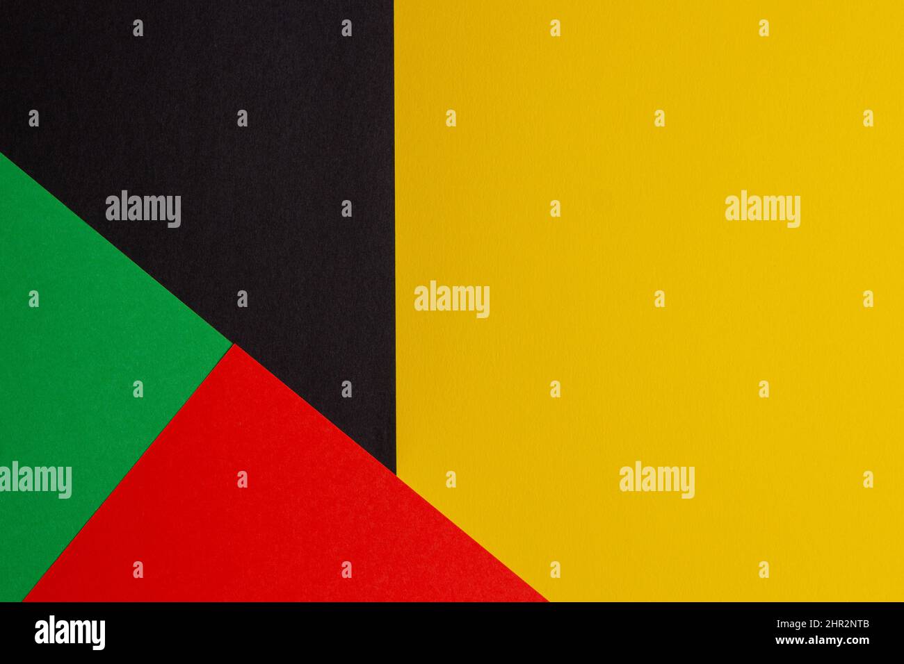 Abstract colored paper geometry composition background in black, red ...