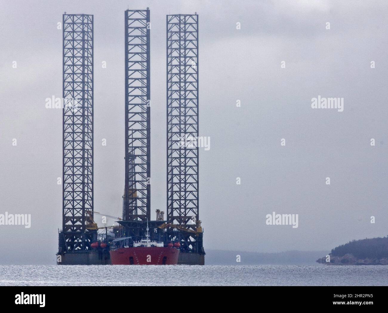 The jack-up rig Rowan Gorilla III is loaded on to the semi-submersible ...