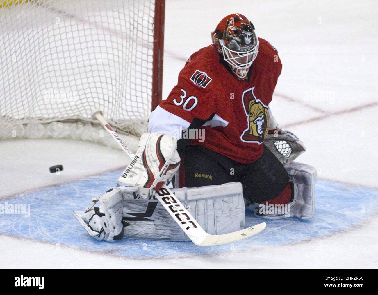 Ottawa Senators goaltender Brian Elliott lets a shot past him during ...