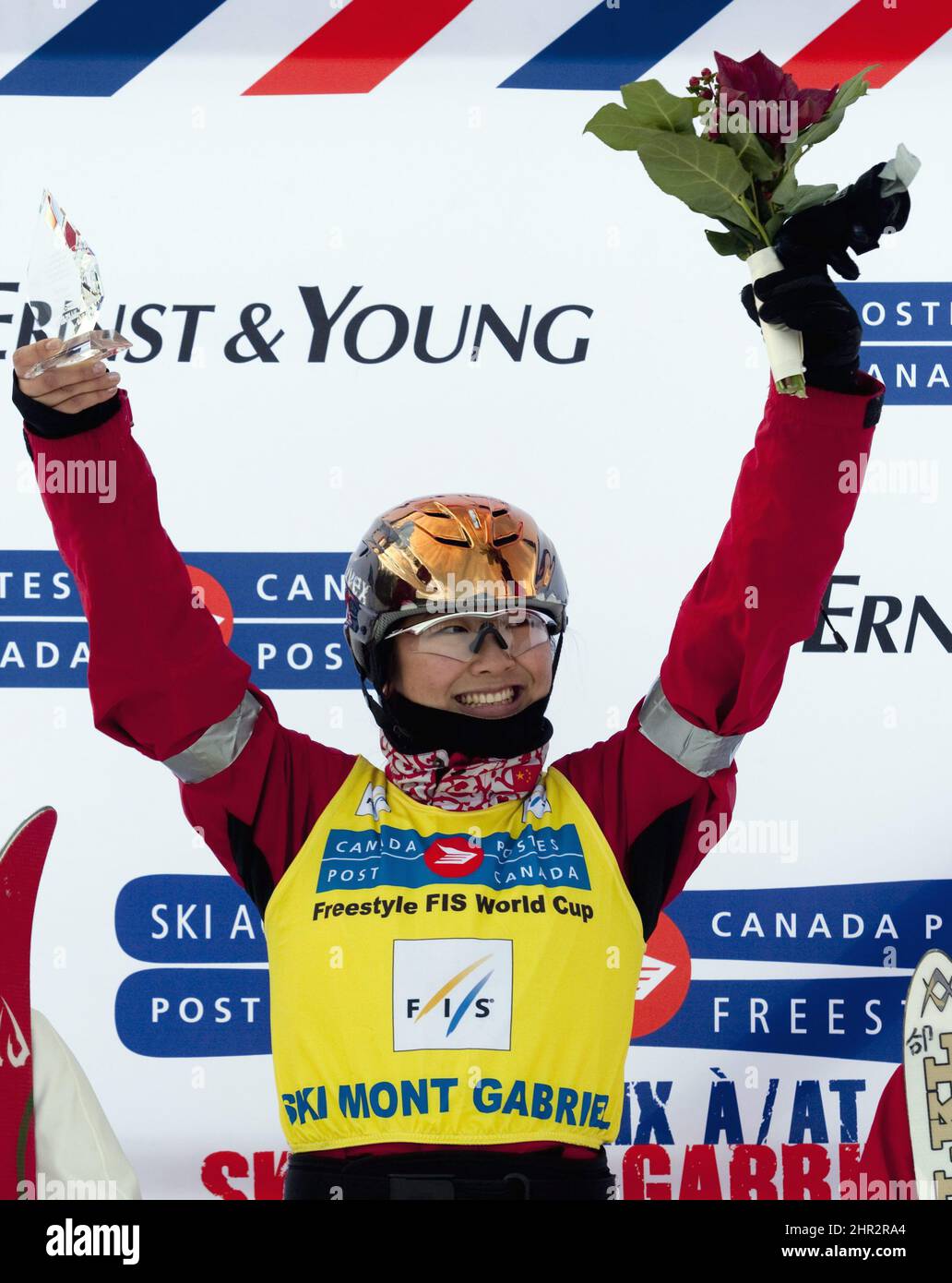 Gold medallist Mengtao Xu of China celebrates on the podium after she ...