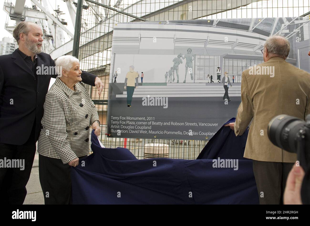 From left, Douglas Copeland, Betty and Rolly Fox unveil the new concept ...