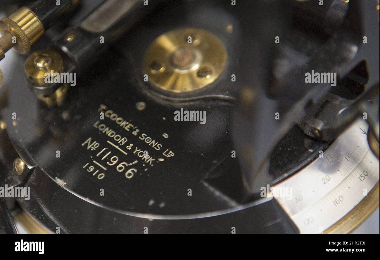 The engraving and serial number of a theodolite made by T. Cooke and ...