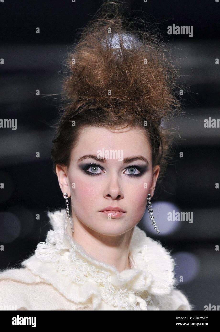 A model wears a design by Nadya Toto during Montreal Fashion Week, in ...