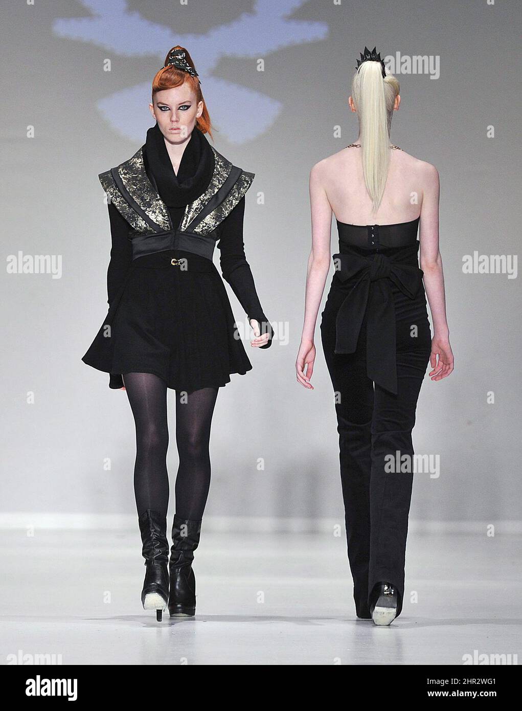 Models wear designs by Anomal Couture during Montreal Fashion Week, in ...
