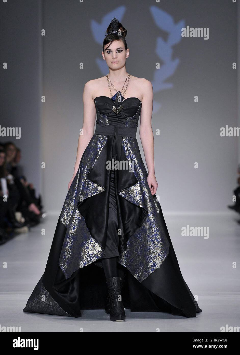 A model wears a design by Anomal Couture during Montreal Fashion Week ...