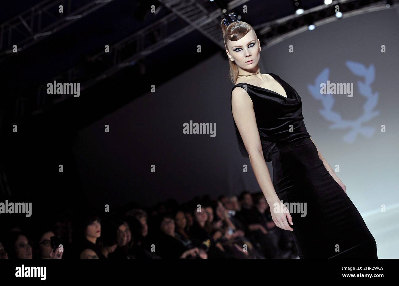 A model wears a design by Anomal Couture during Montreal Fashion Week ...