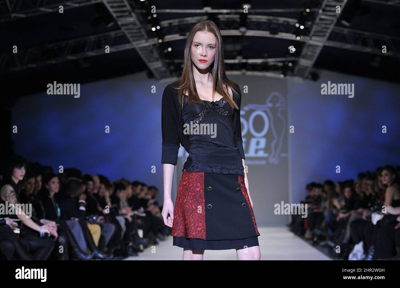 A model wears a design by Annie 50 during Montreal Fashion Week, in ...