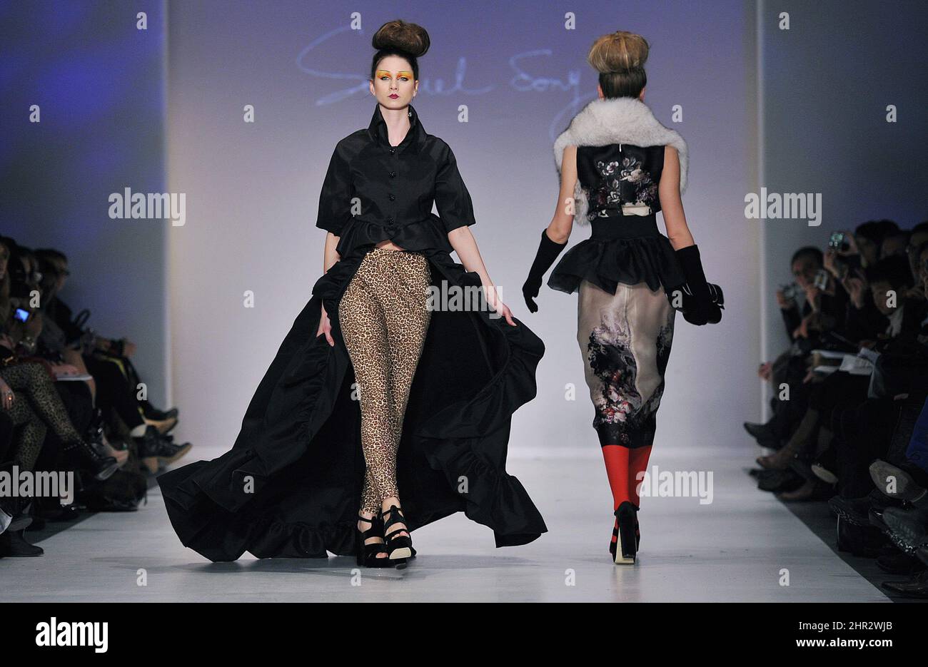 Models wear designs by Samuel Dong during Montreal Fashion Week on ...