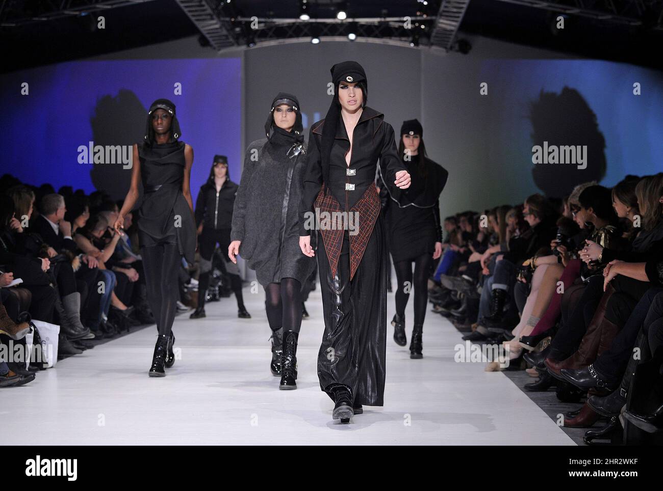 Models wear designs by Cluc Couture during Montreal Fashion Week on ...
