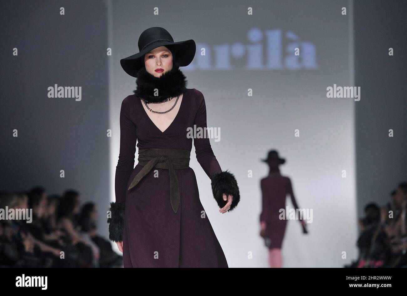 Models wear designs by Barila during Montreal Fashion Week on Thursday ...