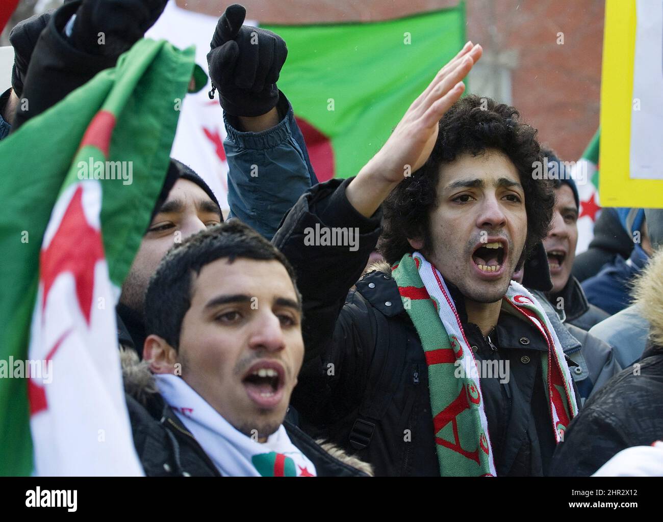 Members of the Algerian community demonstrate outside the Algerian ...
