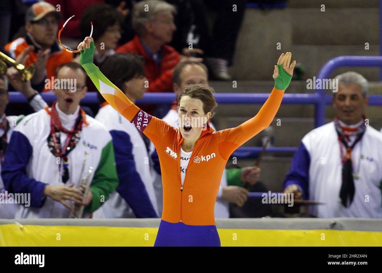 Ireen Wust, from the Netherlands, celebrates winning the women's World ...