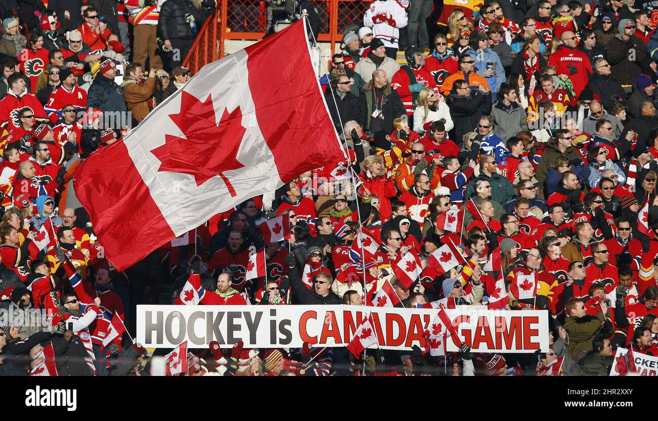 Hockey fans cheer the Montreal Canadiens and the Calgary Flames during ...