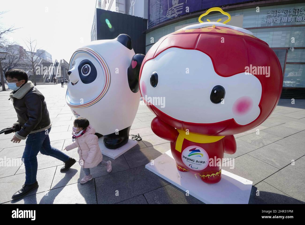 Photo taken Feb. 25, 2022, shows Beijing Winter Paralympic mascot Shuey Rhon Rhon (R), alongside ...