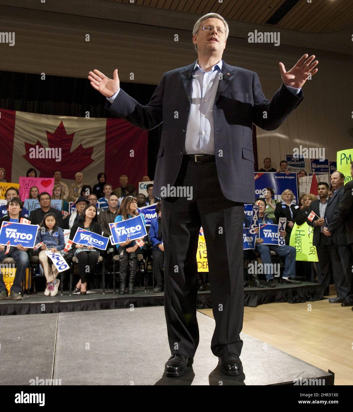 Prime Minister Stephen Harper speaks to supporters as he makes a ...