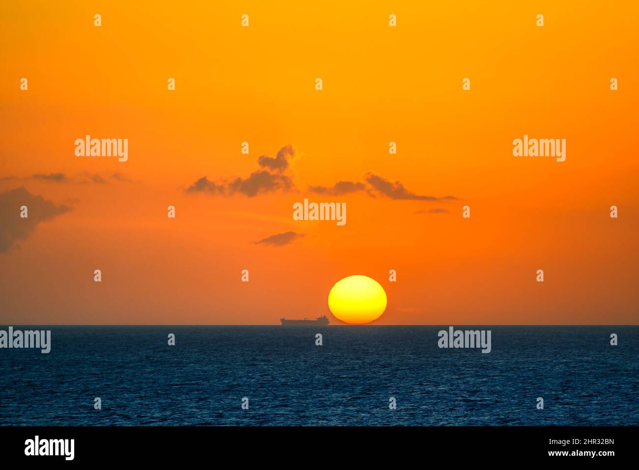 A view of a sunset in front of Oranjestad capital of Aruba Stock Photo ...