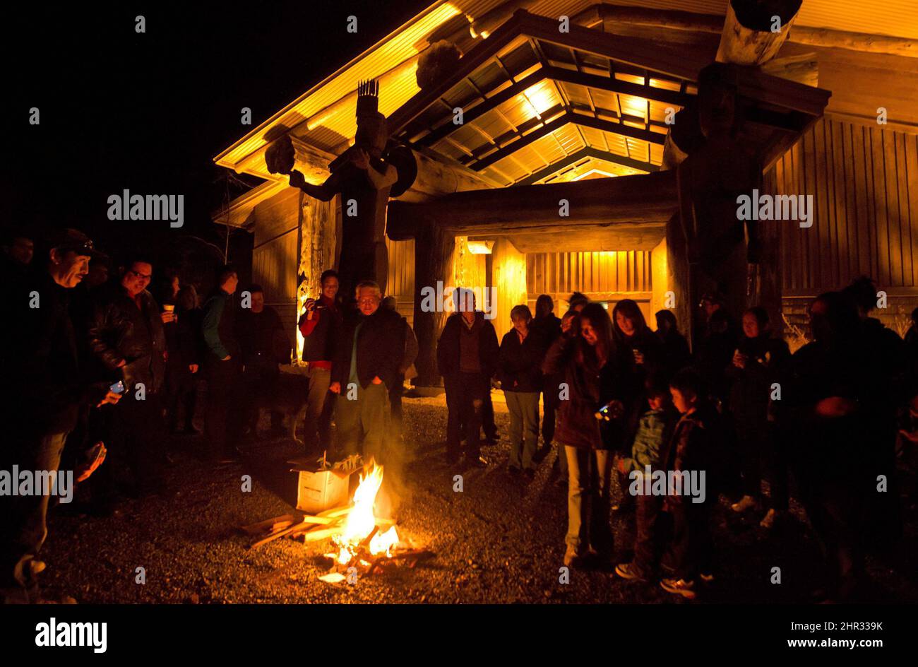 Huu-ay-aht First Nation Chief Councillor Robert Dennis, centre left ...