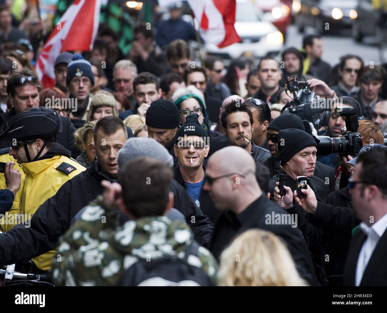 Charlie Sheen is seen walking and smoking through downtown Toronto with ...