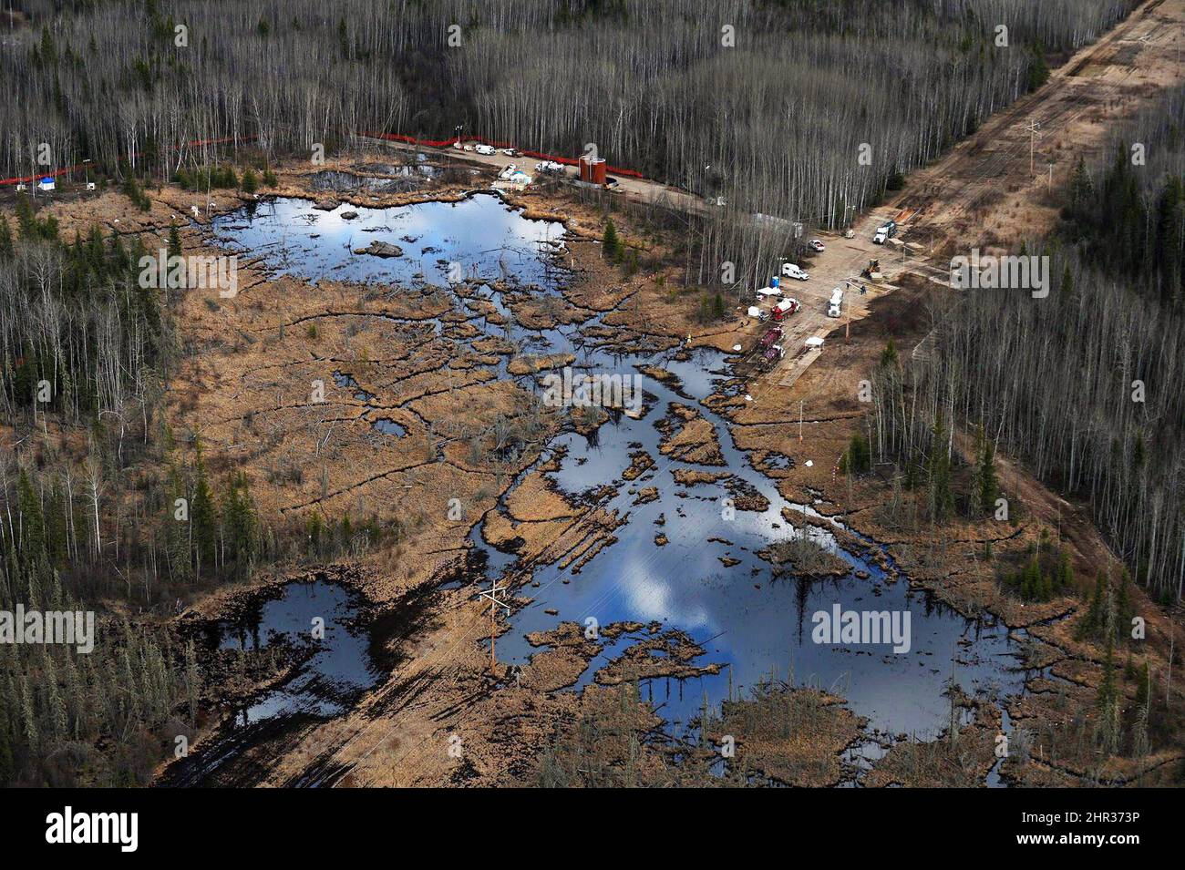 Aerial photos of the cleanup of a pipeline break northeast of Peace ...
