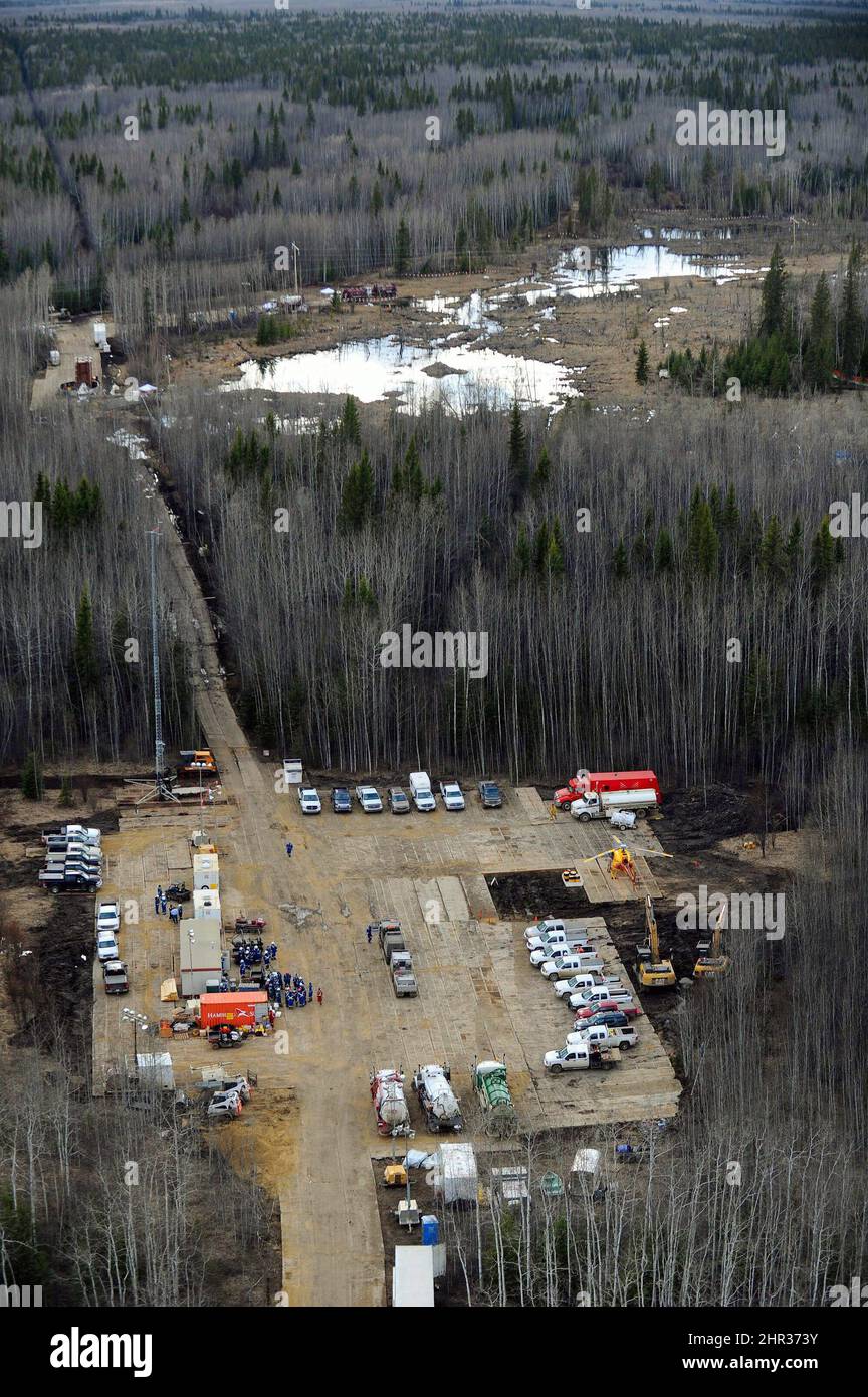 Crews assemble at the site of a pipeline break northeast of Peace River ...