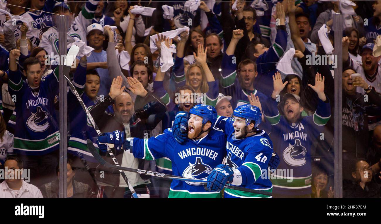 Vancouver Canucks' Raffi Torres, left, and Maxim Lapierre celebrate ...