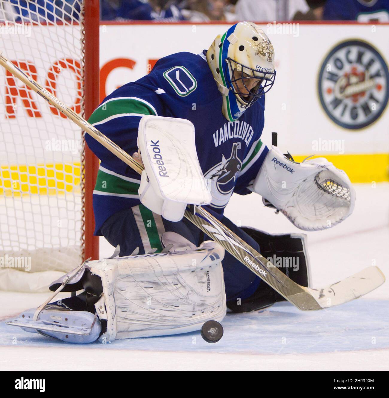 Vancouver Canucks Roberto Luongo makes a pad save against the San Jose ...