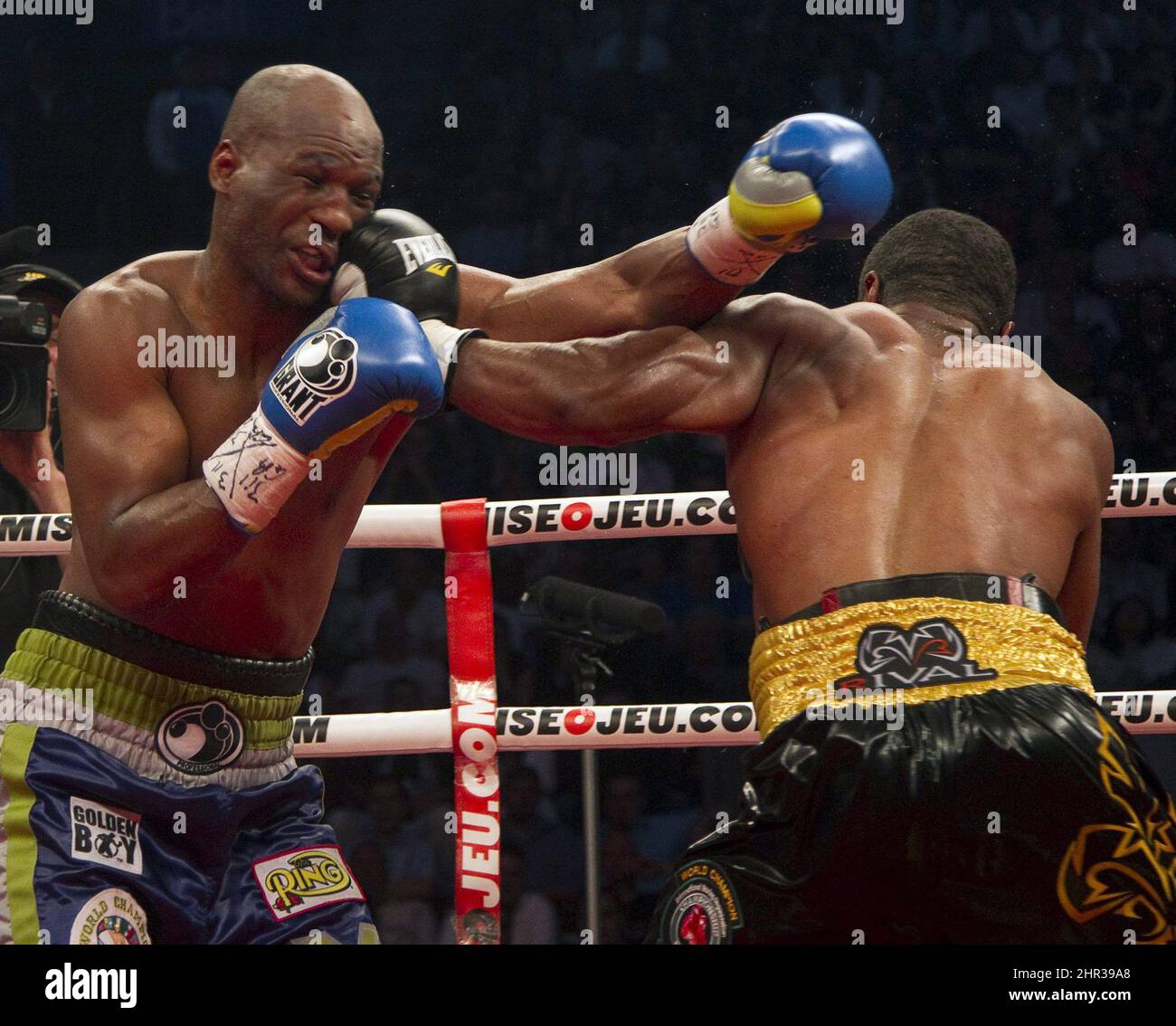 Jean Pascal, right, from Montreal, trades punches with Bernard Hopkins ...