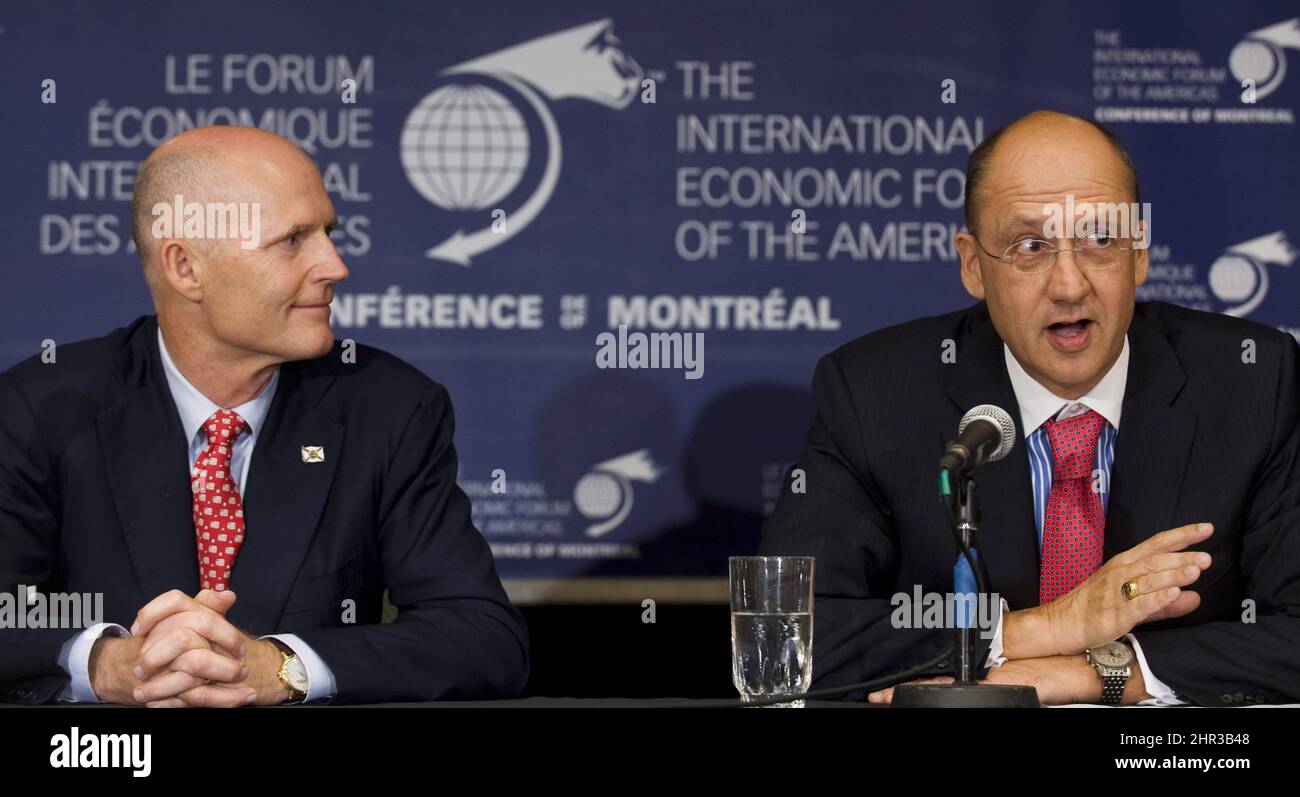 Governor of the State of Florida Rick Scott, left, listens to President ...