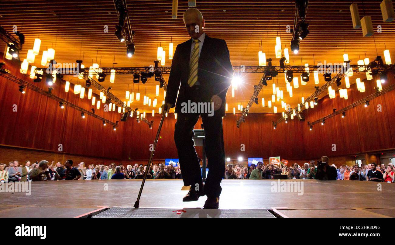 NDP Leader Jack Layton leaves the stage after delivering his keynote ...