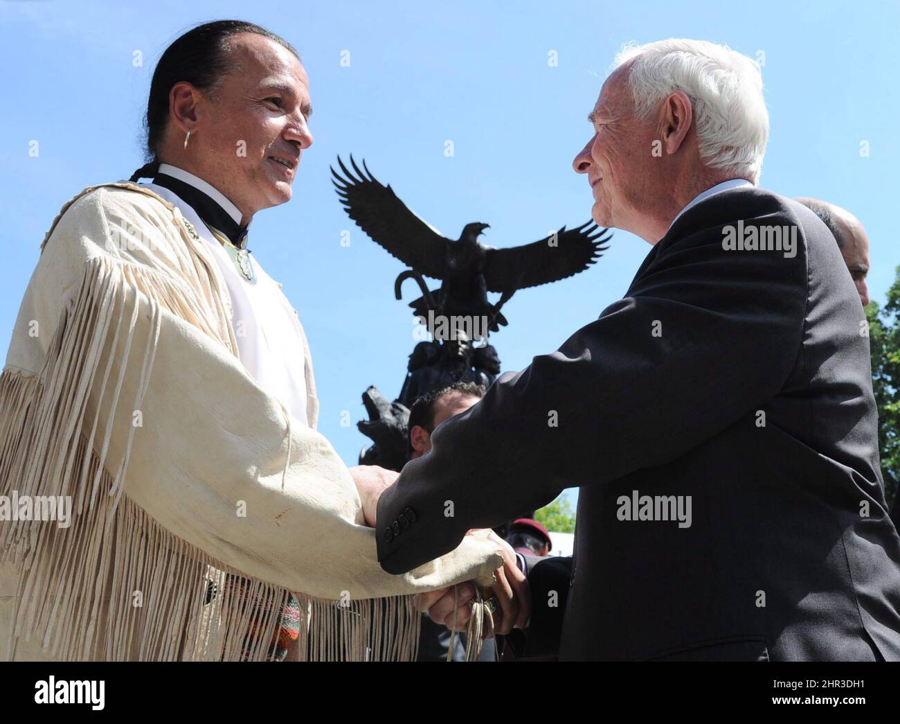 Governor General David Johnston, right, shakes hands with Ottawa Town ...