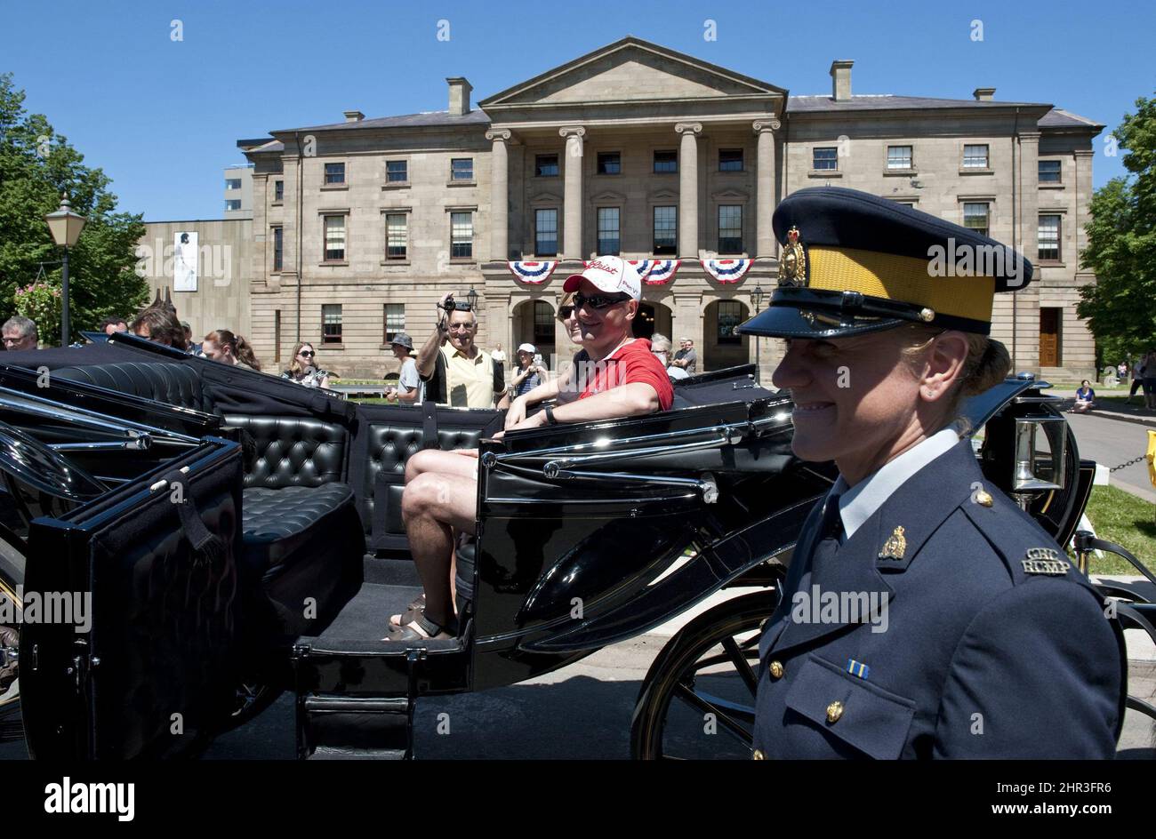 Prince Edward Island Premier Joe Ghiz and his wife Kate sit in a landau ...