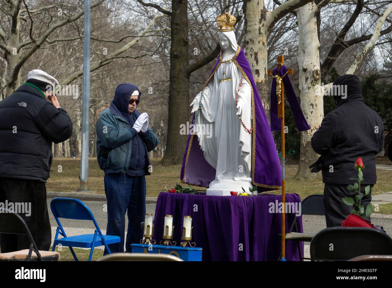 Devout Roman Catholics pray at the Vatican Pavilion site in Flushing ...