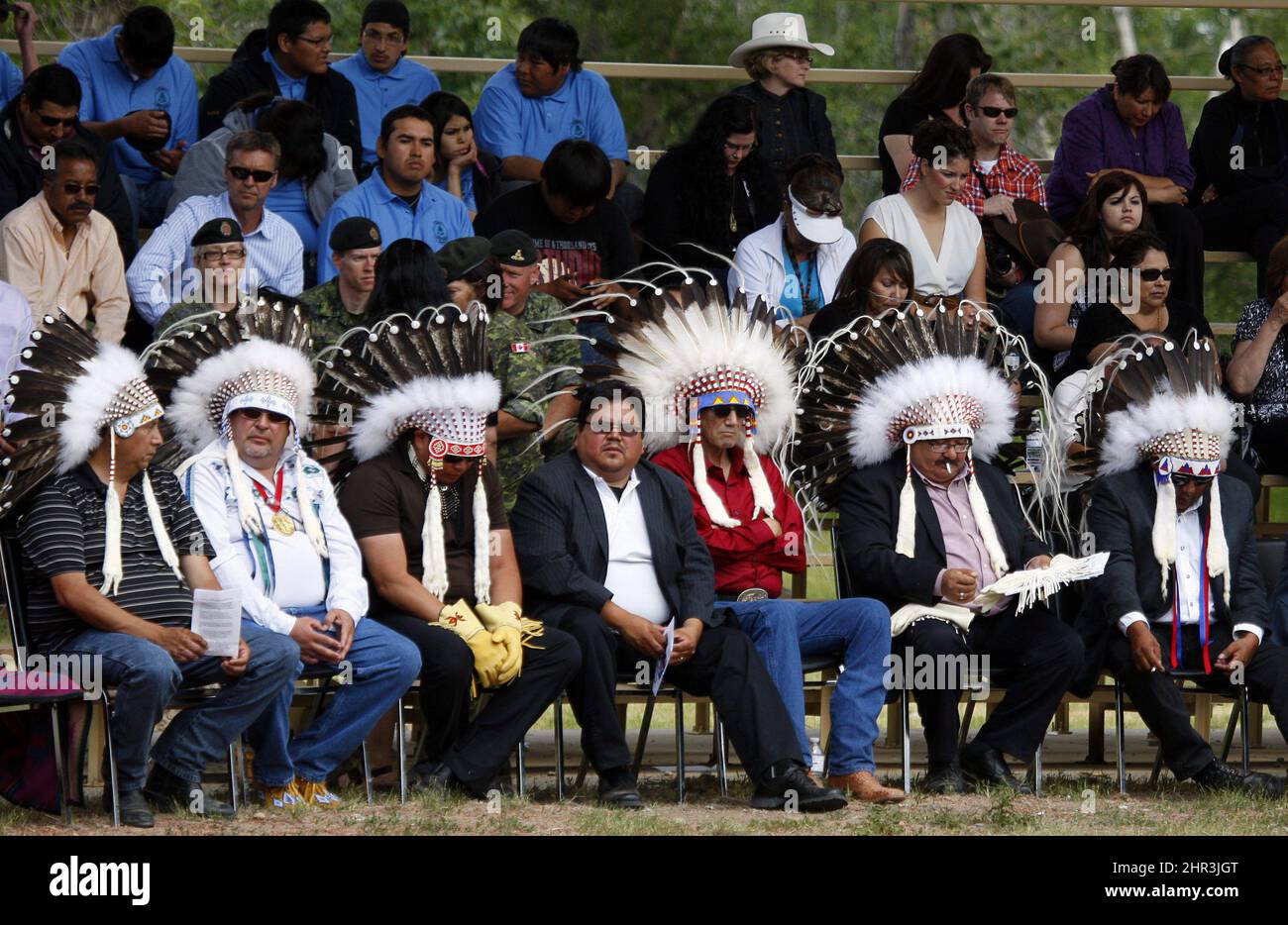 Native leaders wait for Prime Minister Stephen Harper during ceremony ...
