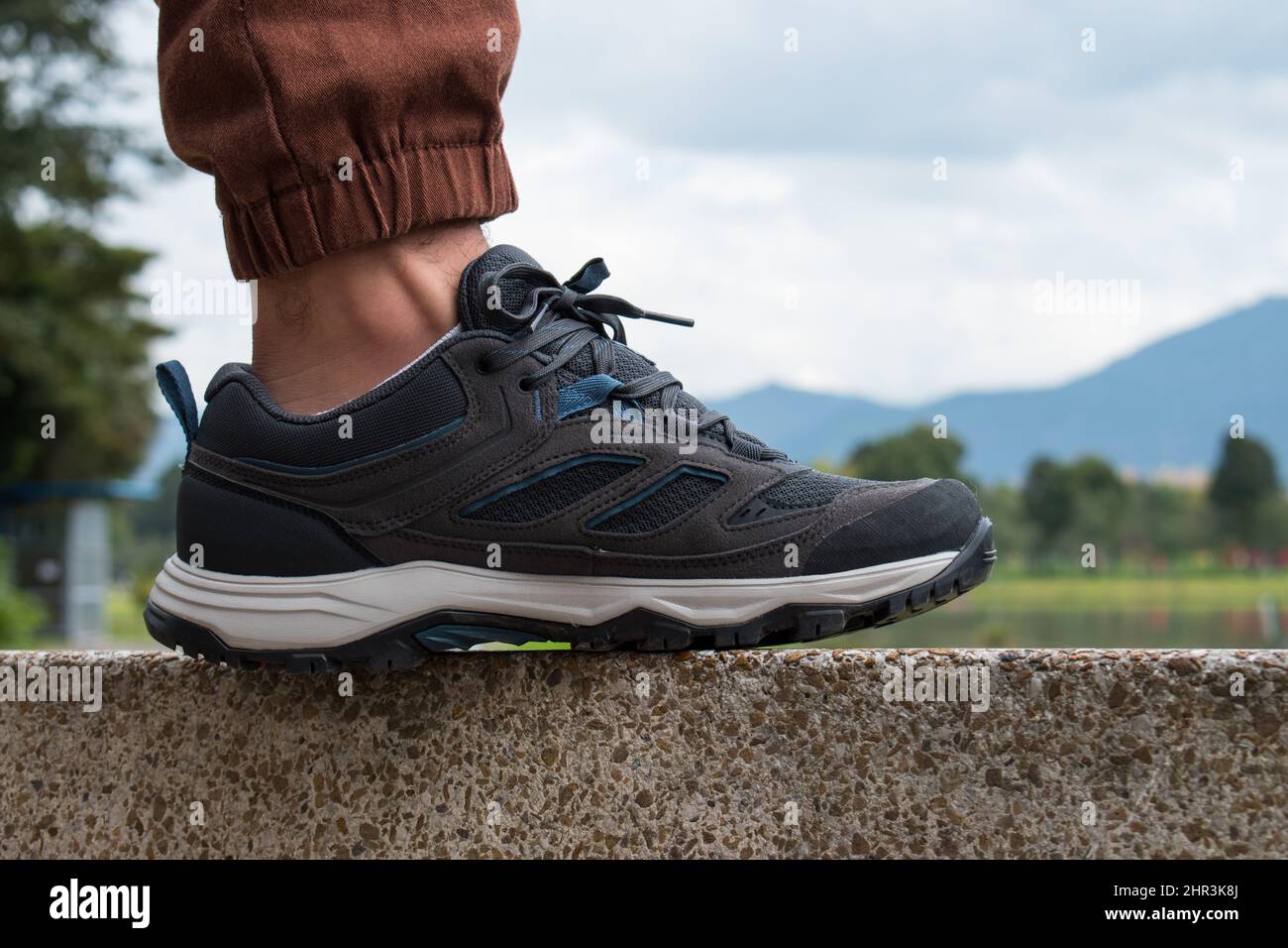Closeup shot of a man's foot in a stylish sneaker Stock Photo - Alamy
