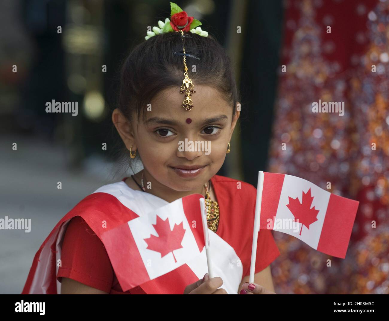 Shahnaz Begum smiles as she enjoys the annual Canada Day celebrations ...