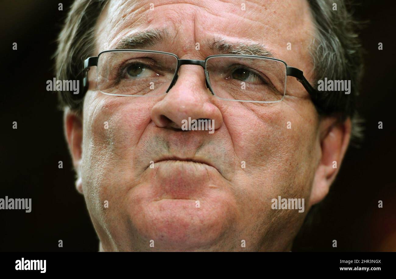 Minister of Finance Jim Flaherty speaks to reporters as he arrives to ...