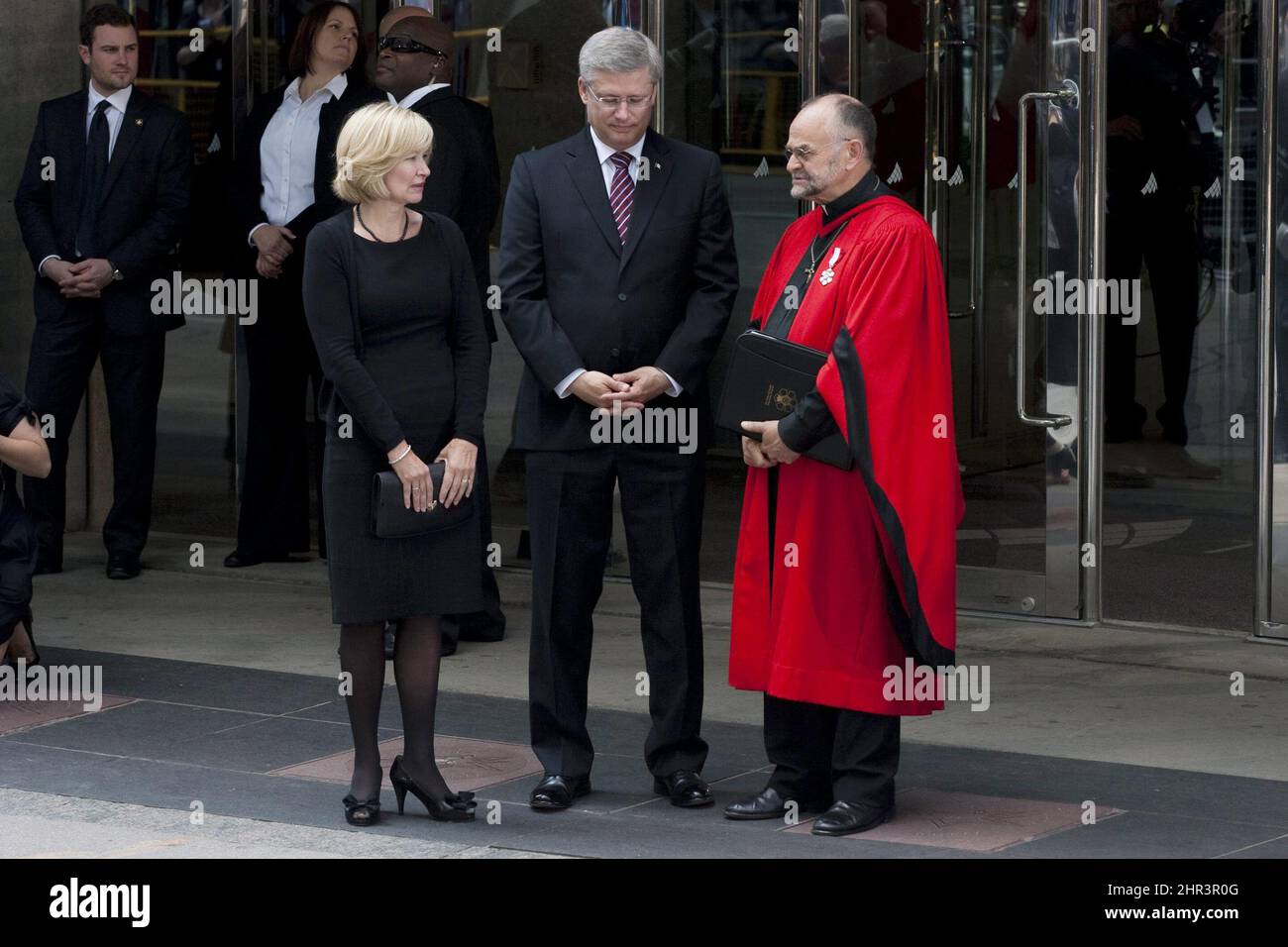 Prime Minister Stephen Harper, centre, and his wife Laureen stand with ...