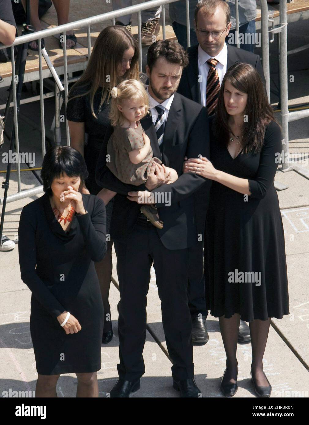 Olivia Chow stands with Mike Layton, second right, and Sarah Campbell, right, as they prepared ...