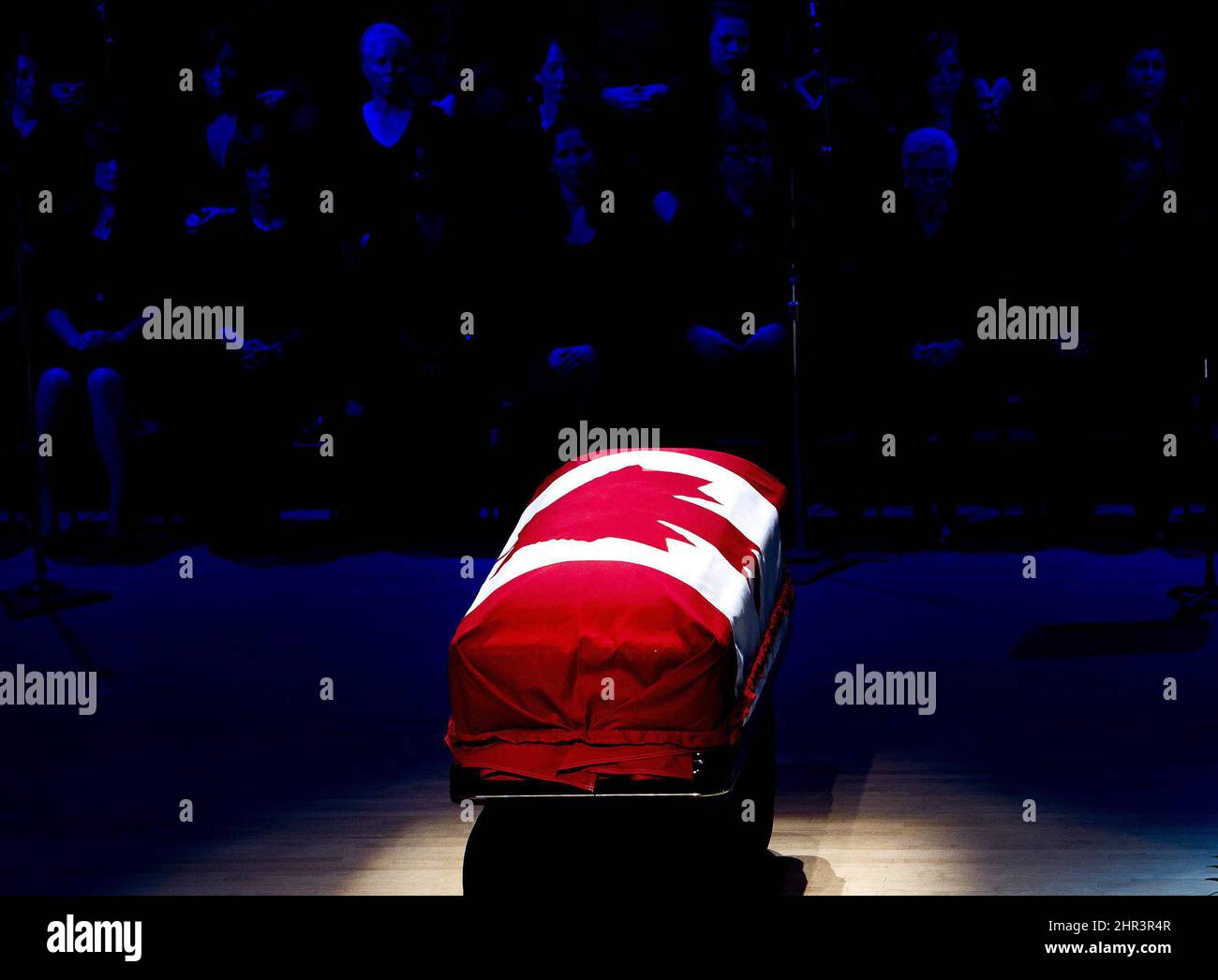 The coffin of the late NDP leader Jack Layton rests on stage at his ...